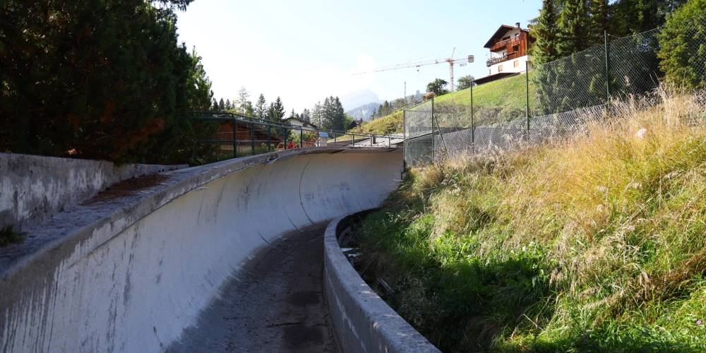 FOTO: graustu neatjaunos. Milānas un Kortīnas olimpisko spēļu ledus ...